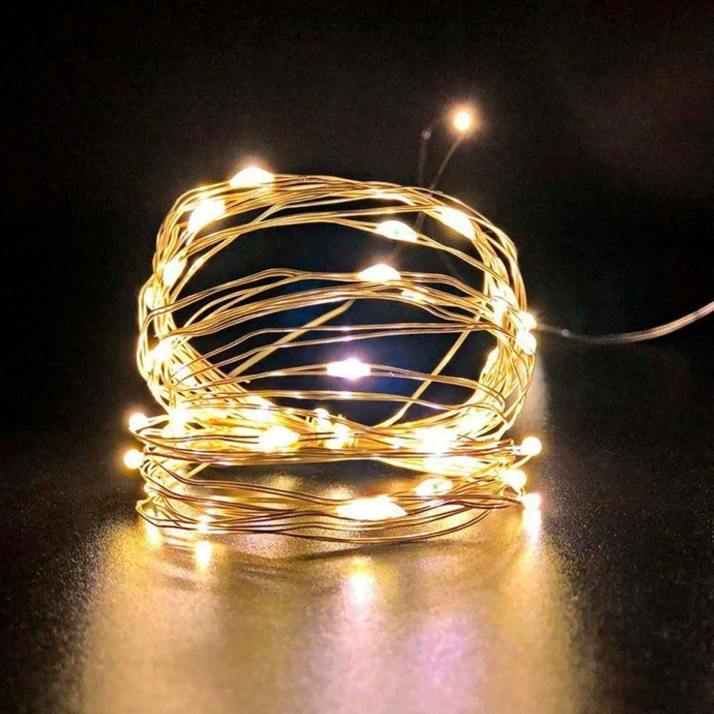 PISCA LED FIO DE FADA A PILHA 50 LÂMPADAS - BRANCO QUENTE - 5MT